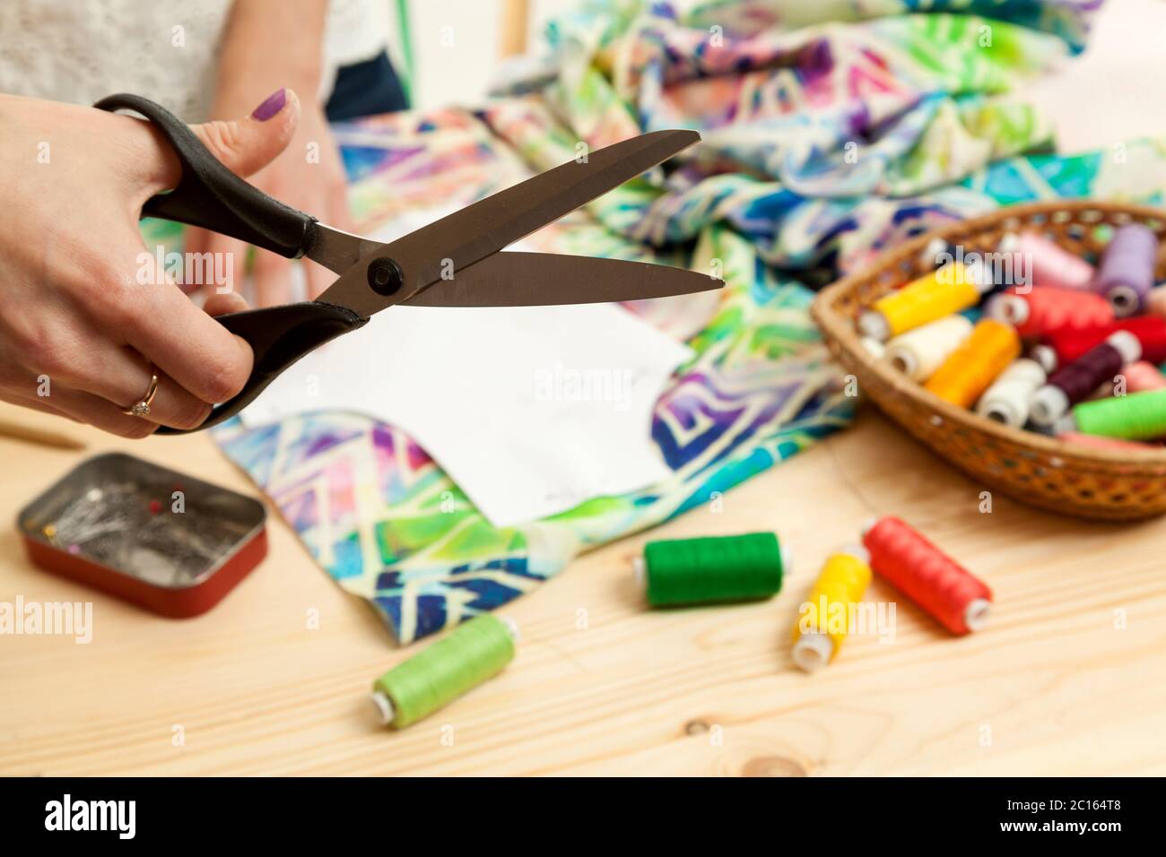 cutting a detail of a product on fabric Stock Photo - Alamy