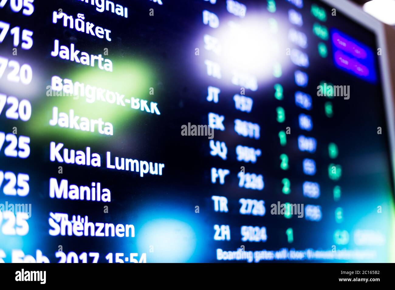 screen with flight information in airport Stock Photo - Alamy