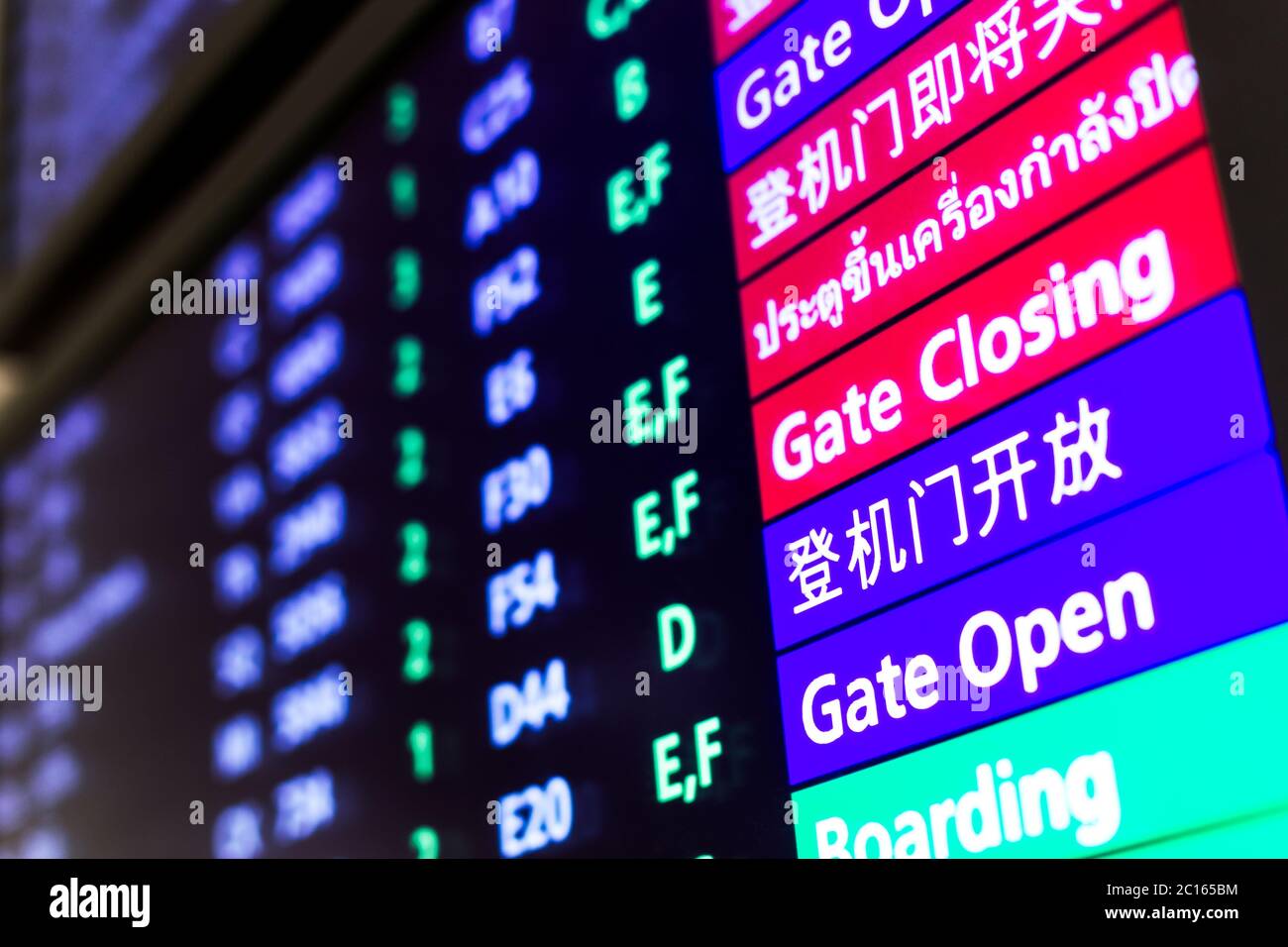 screen with flight information in airport Stock Photo - Alamy