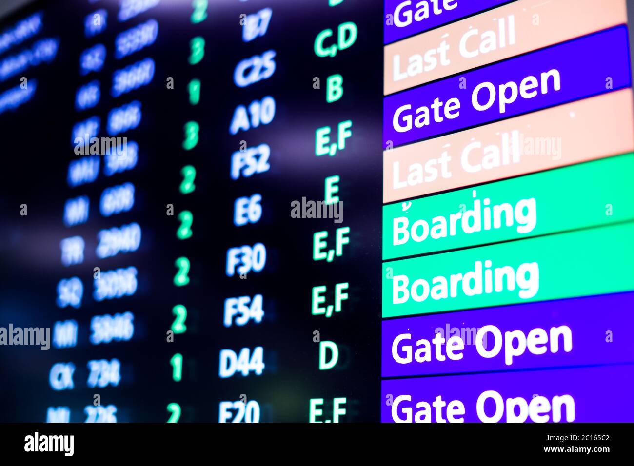 Flight information screen in airport hi-res stock photography and ...