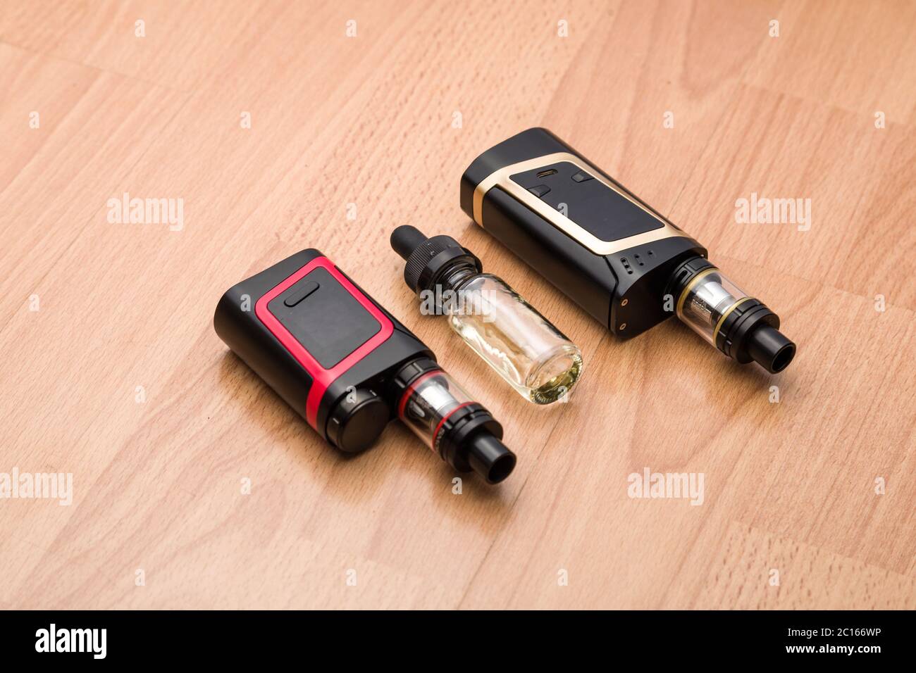 Vaping electronic mech mod and vape liquid Stock Photo - Alamy