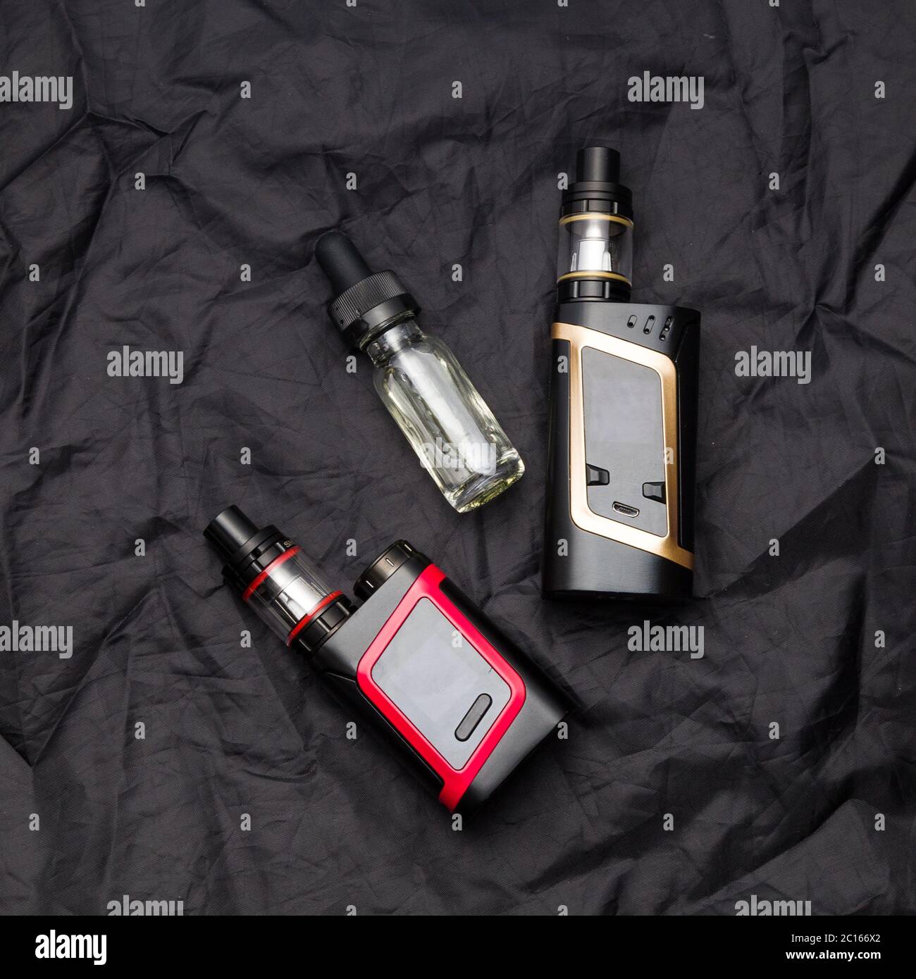 Vaping electronic mech mod and vape liquid Stock Photo - Alamy