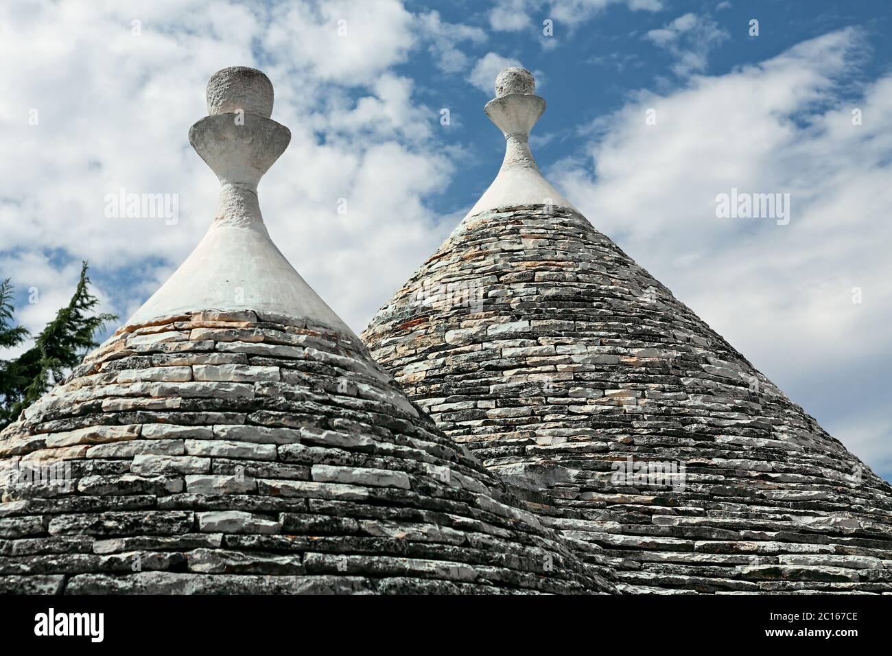 Typical conical roofs of Trulli houses in Alberobello, Apulia, Italy ...