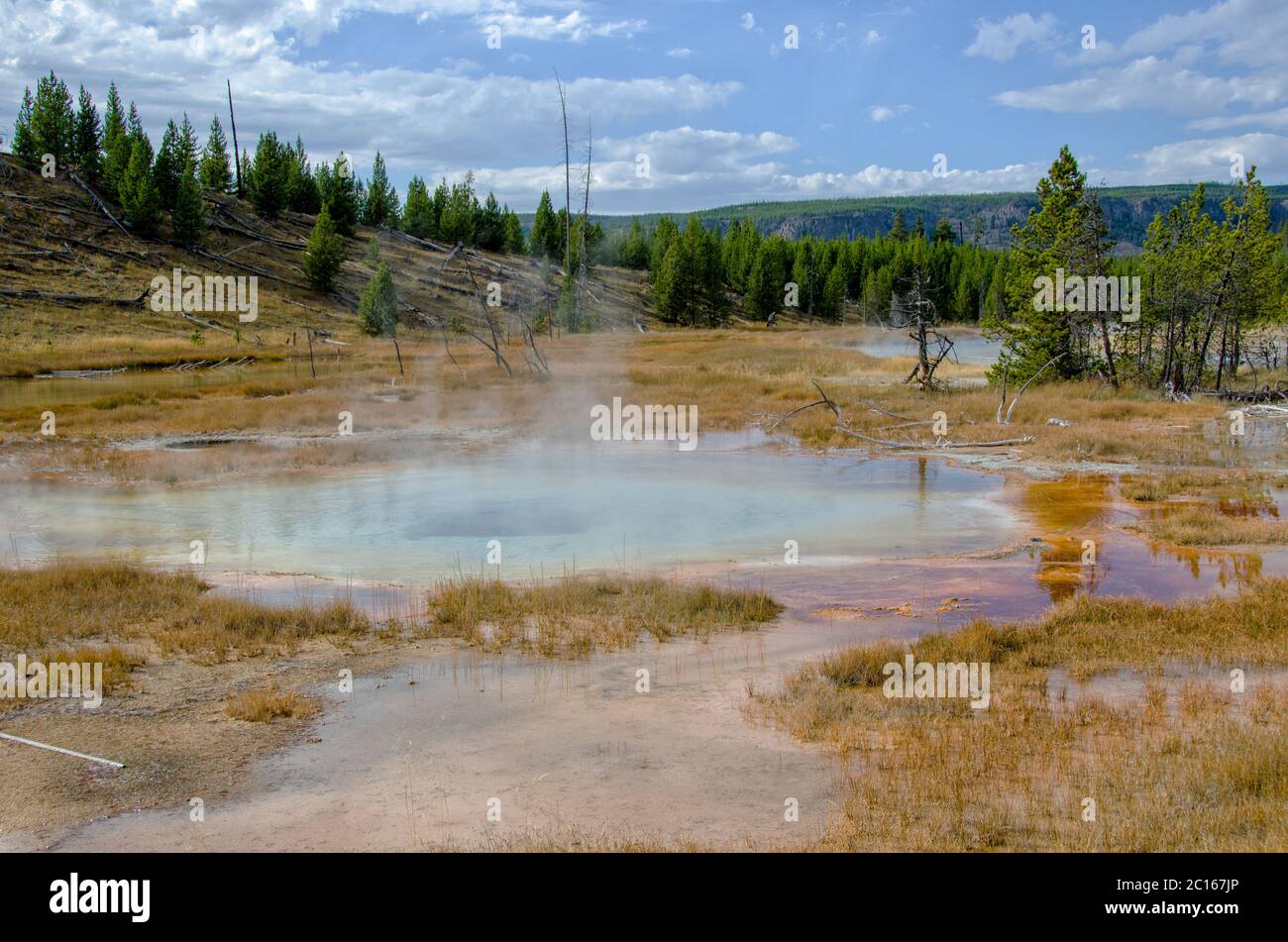 Square Spring in Yellowstone National Park with Steam Rising Stock ...