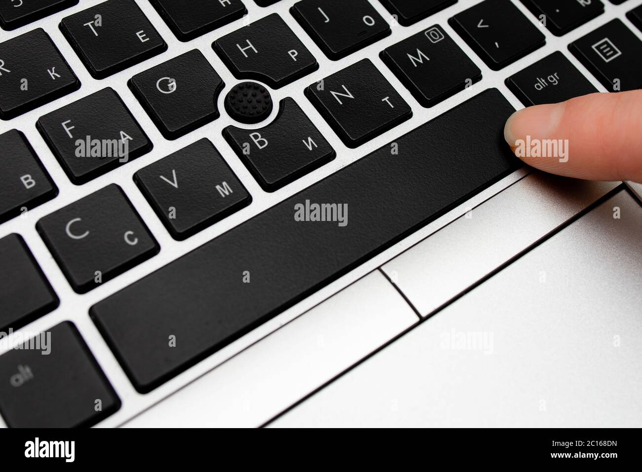 Pc keyboard key with pointing finger above background copy space Stock ...