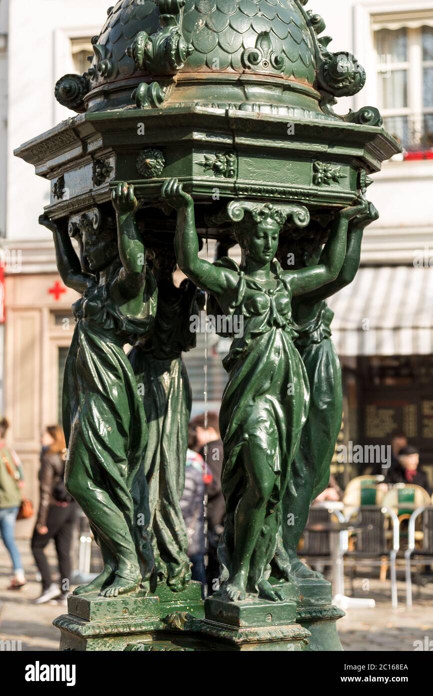 One of the drinking antique Wallace fountains with women group ...
