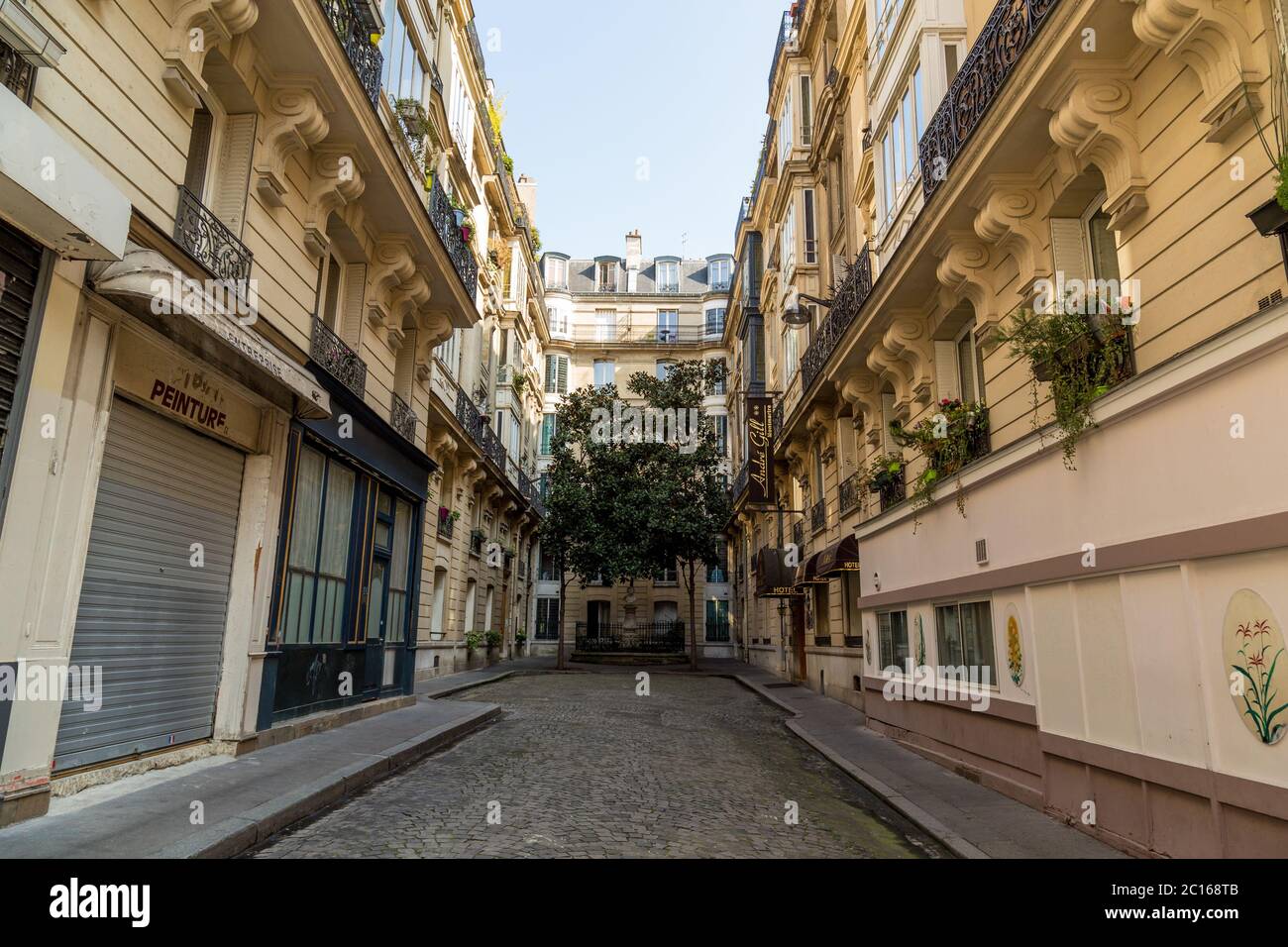 Paris, France, March 26, 2017: View on narrow cobbled street among ...