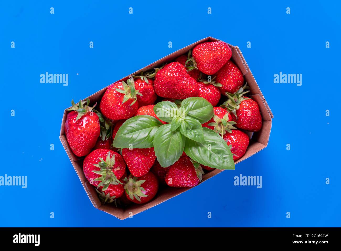 Strawberries in a carton from a supermarket Stock Photo - Alamy