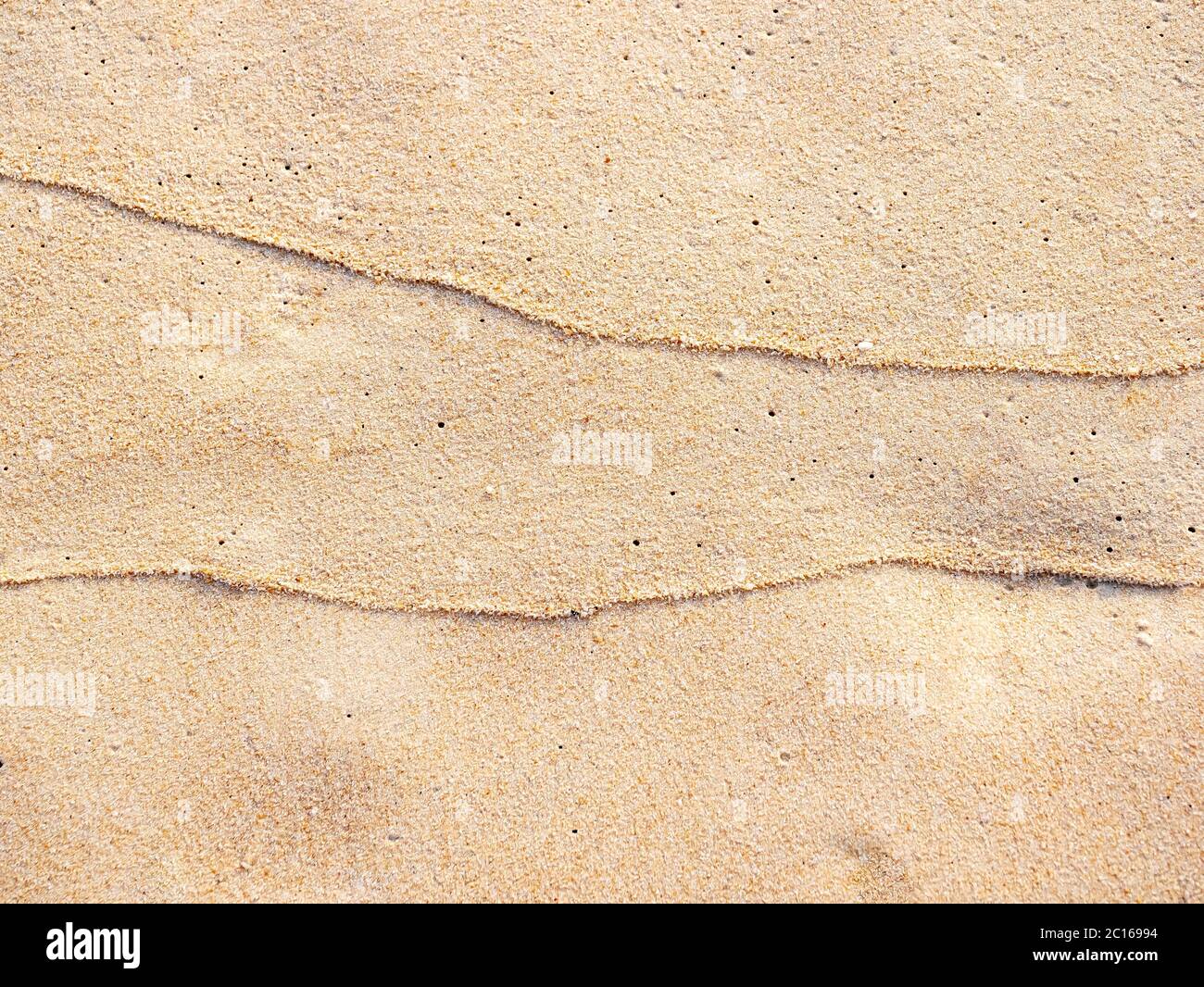 close up sand ground floor at the sea beach , background and textured ...