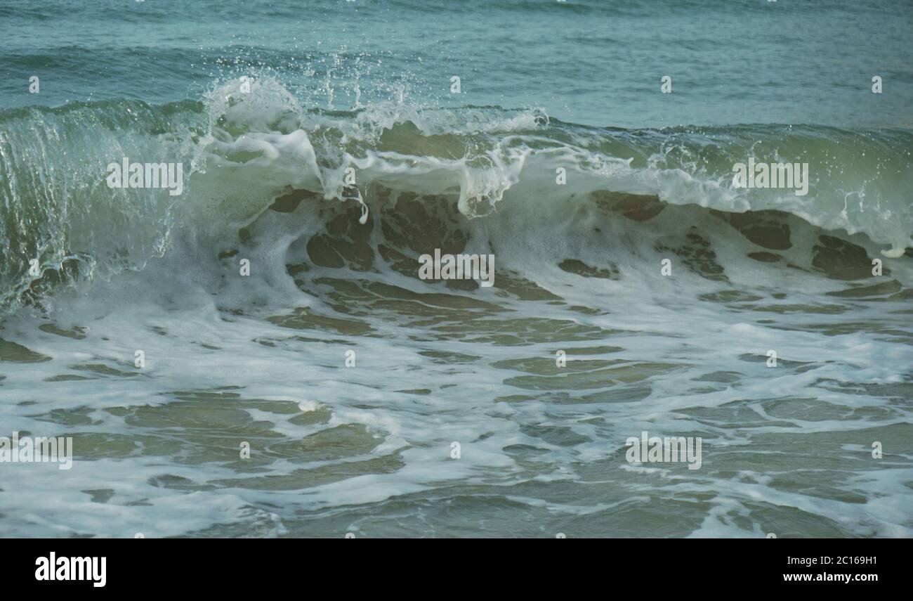 Beautiful waves of South China Sea on Dadonghai beach Stock Photo - Alamy