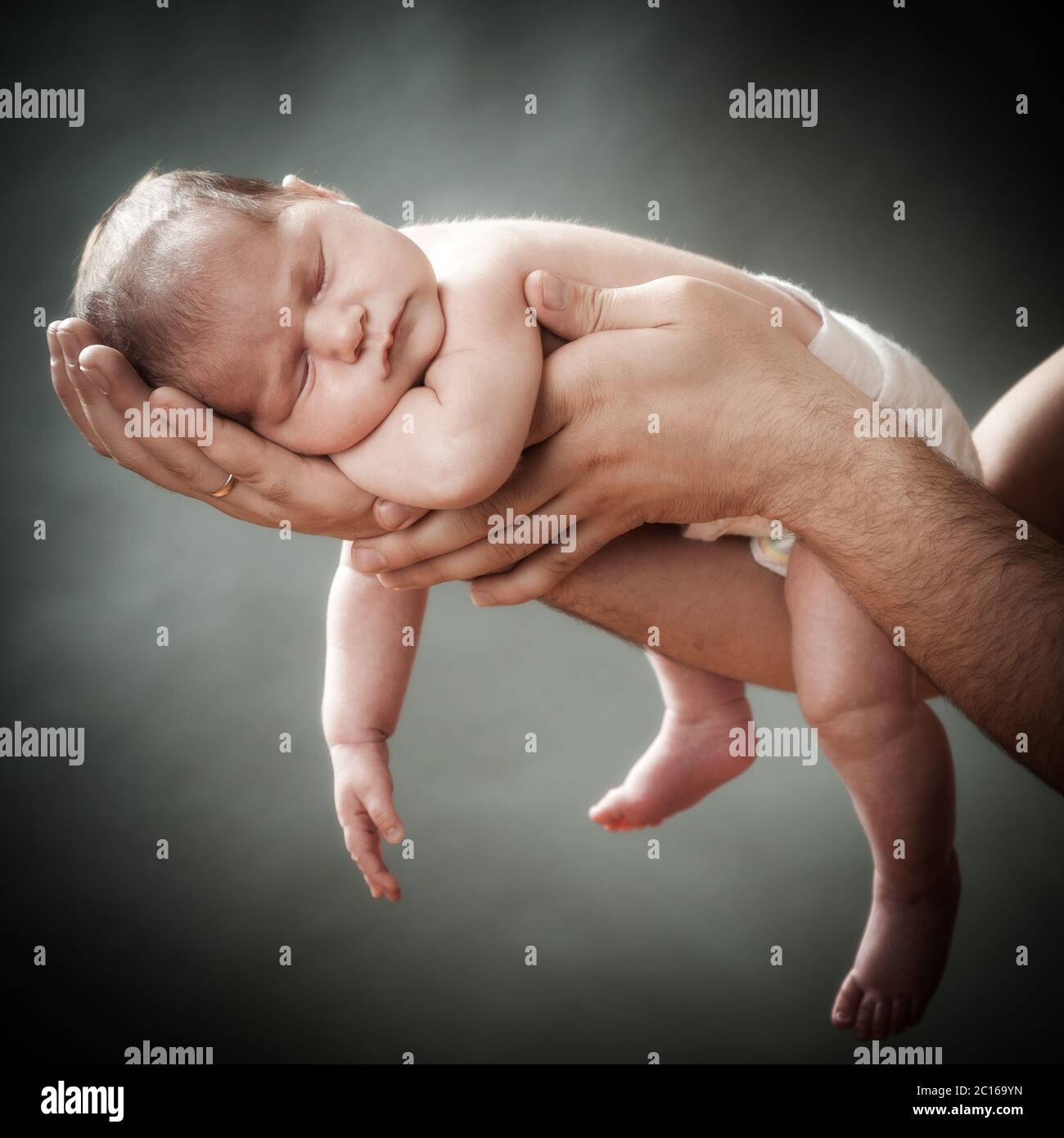 the newborn child on hands Stock Photo - Alamy