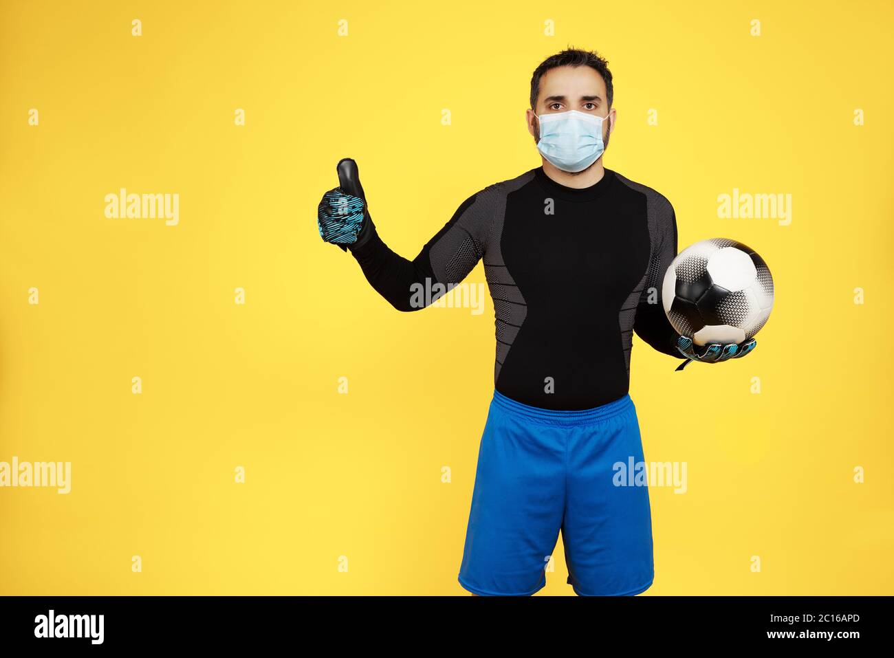 football soccer goalkeeper with a mask on his face due to the ...
