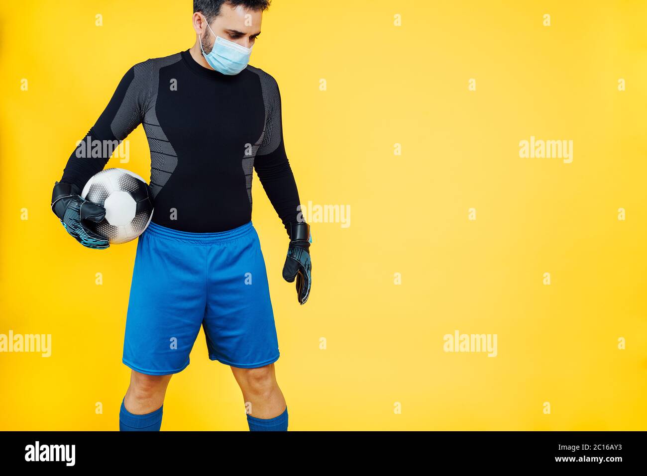 football soccer goalkeeper with a mask on his face due to the ...
