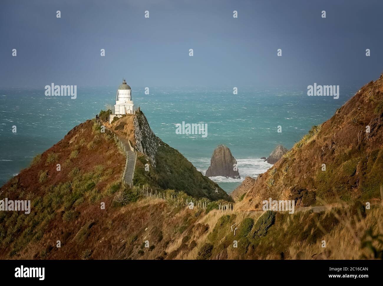 Nugget Point lighthouse Stock Photo - Alamy