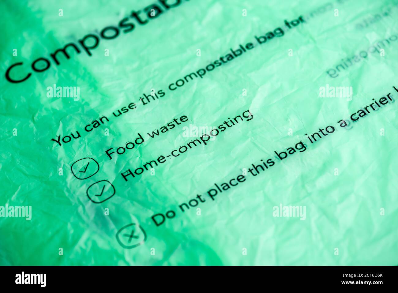 Compostable carrier bag by Co-Op to use at home for food waste and home ...