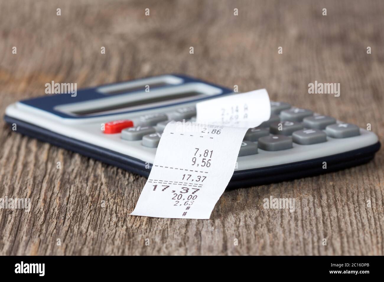 Calculator with printed receipt Stock Photo - Alamy
