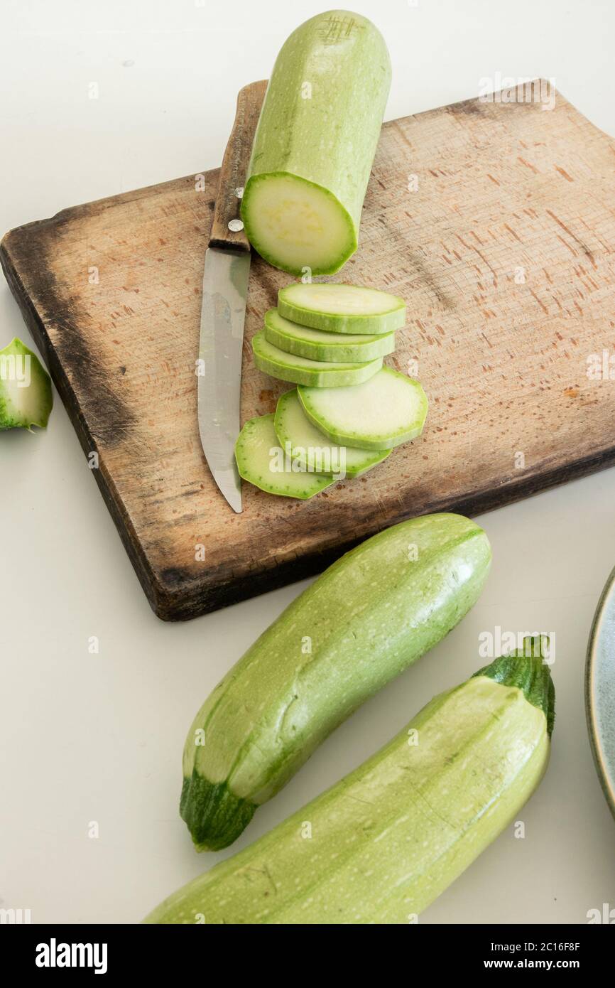 Cooking fresh ripe garden zucchini. Raw organic vegetables Stock Photo ...