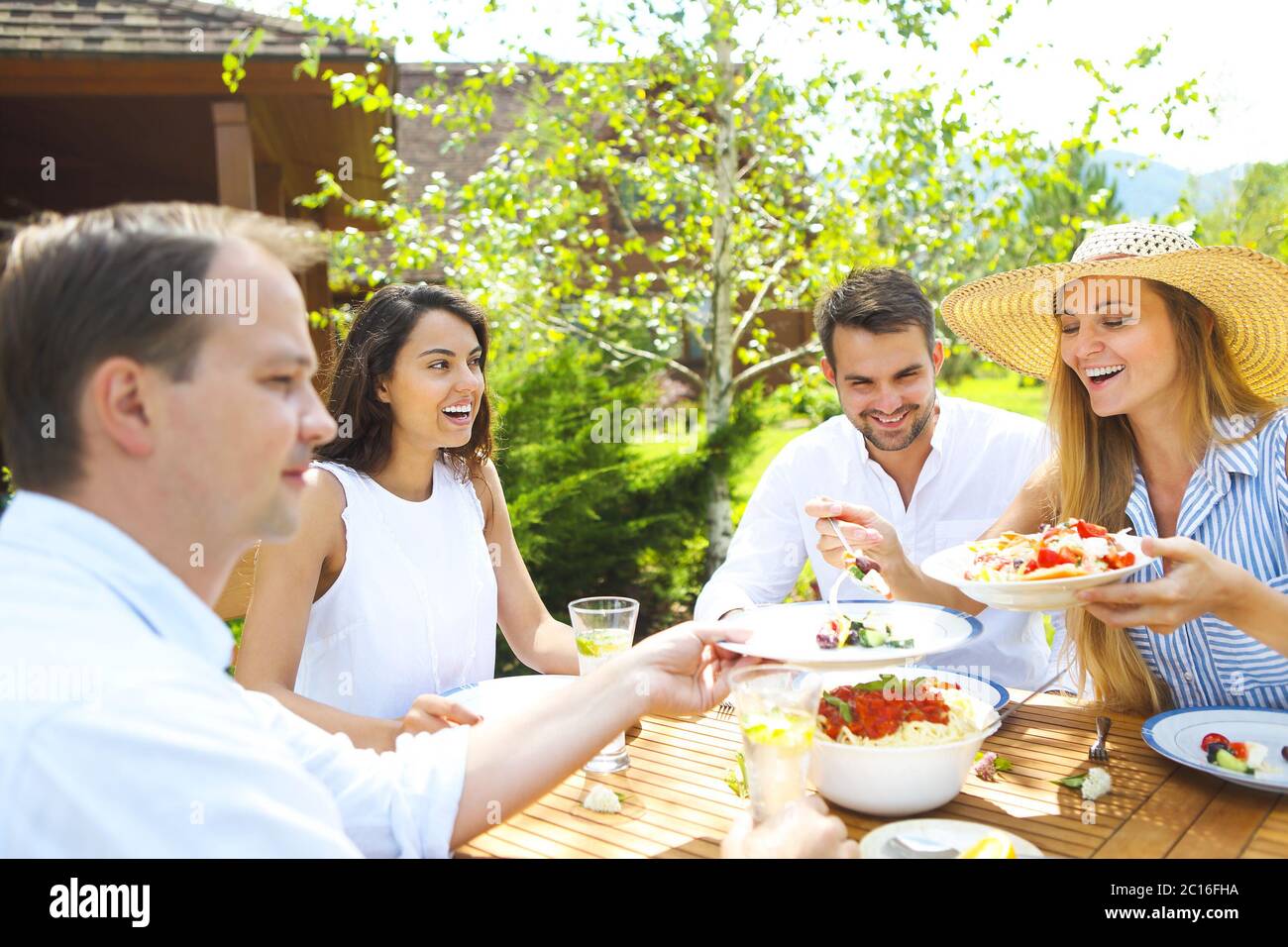 Dinner variety of Italian dishes and lemonade in the garden Stock Photo ...