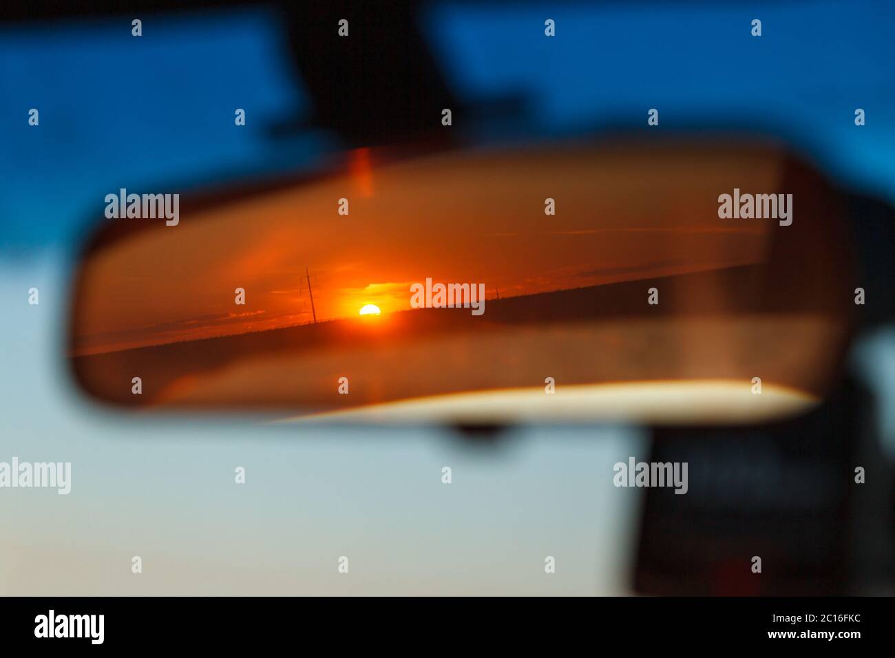 Sun reflecting in car mirror hi-res stock photography and images - Alamy