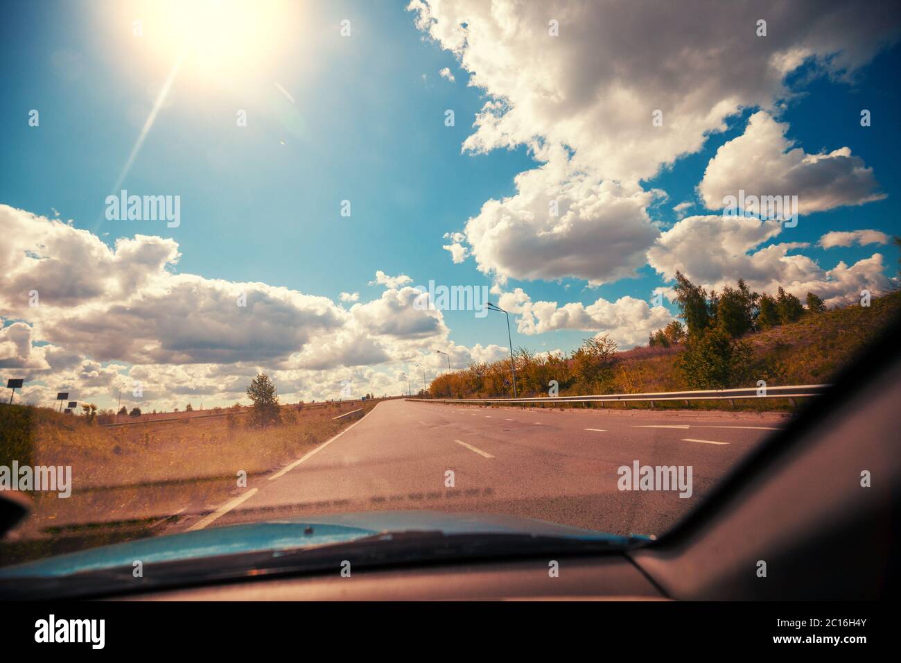 Driving a car on highway on a sunny day. Journey by car. View from car ...