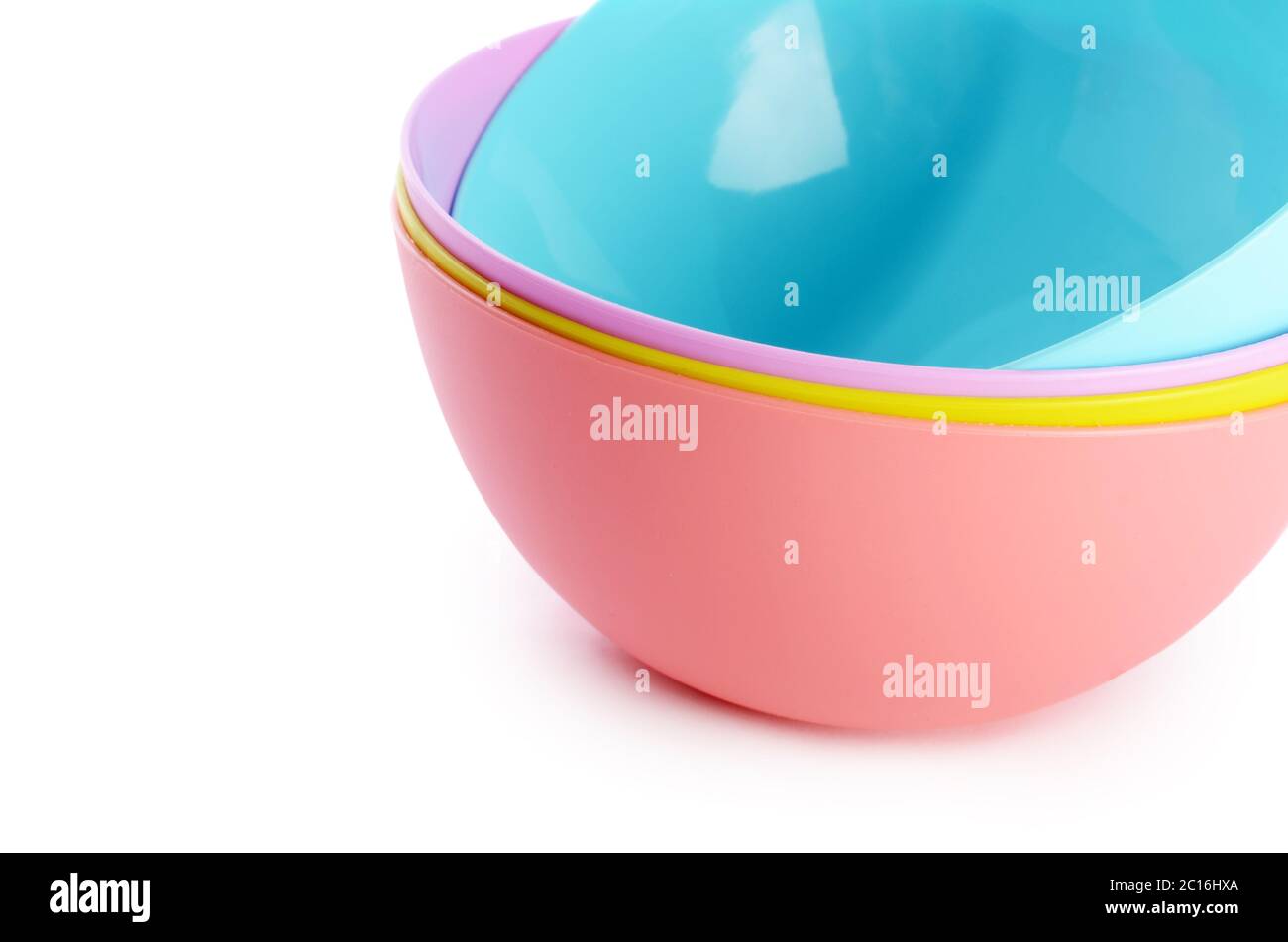 Plastic colorful plates isolated on white Stock Photo - Alamy