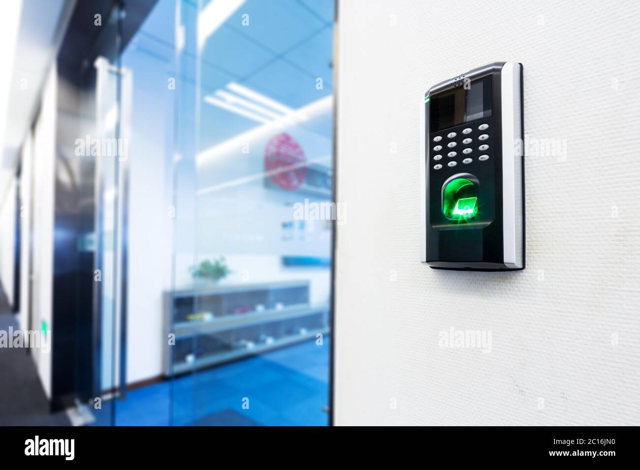 fingerprint scanner on wall Stock Photo - Alamy