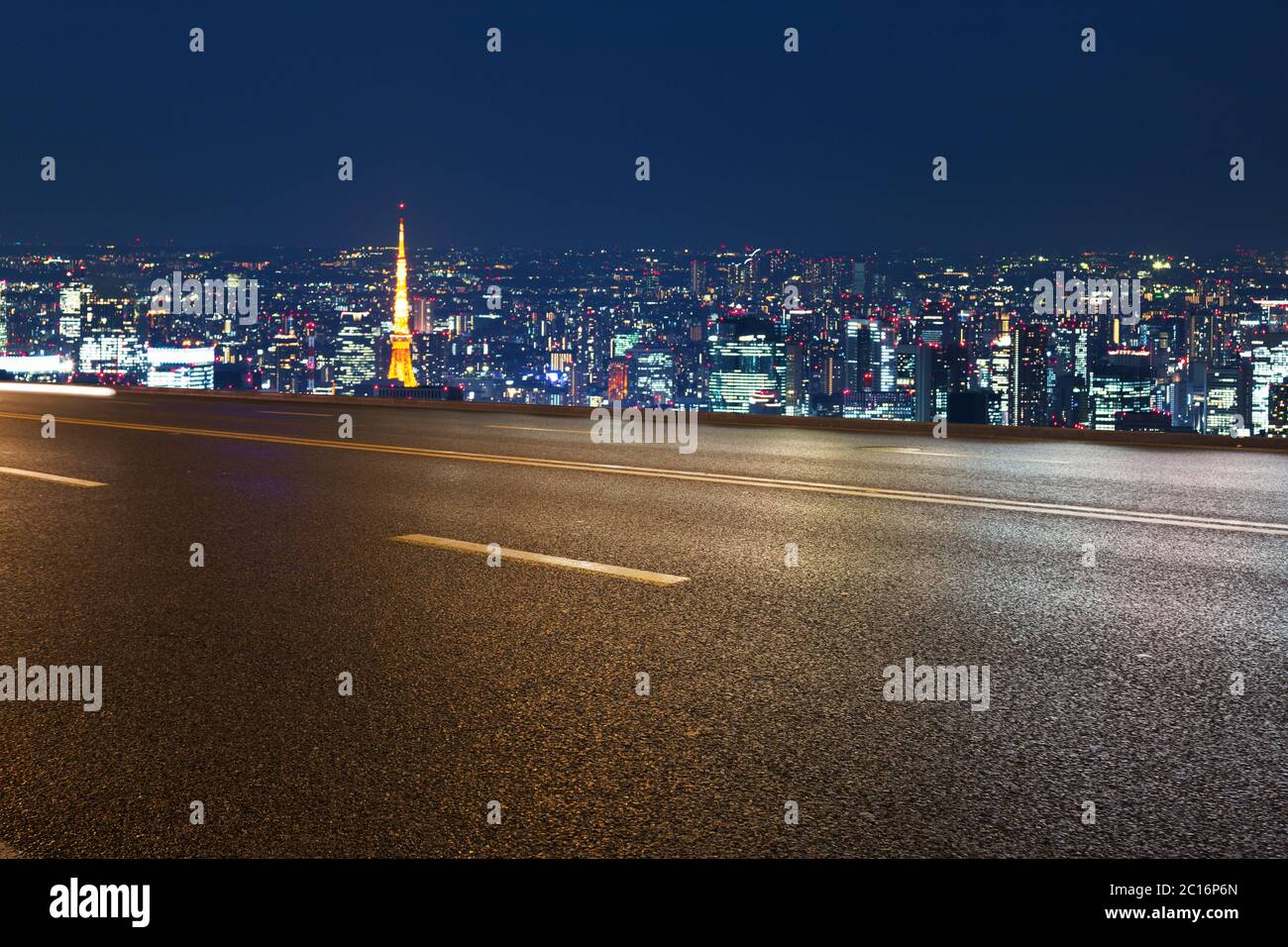 empty road with cityscape of tokyo at night Stock Photo - Alamy