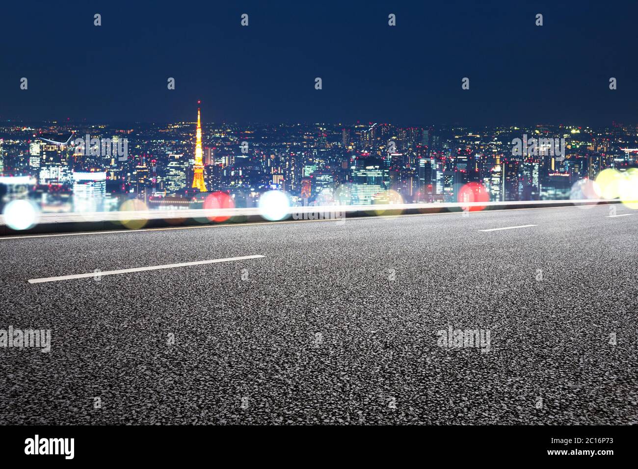 empty road with cityscape of tokyo at night Stock Photo - Alamy
