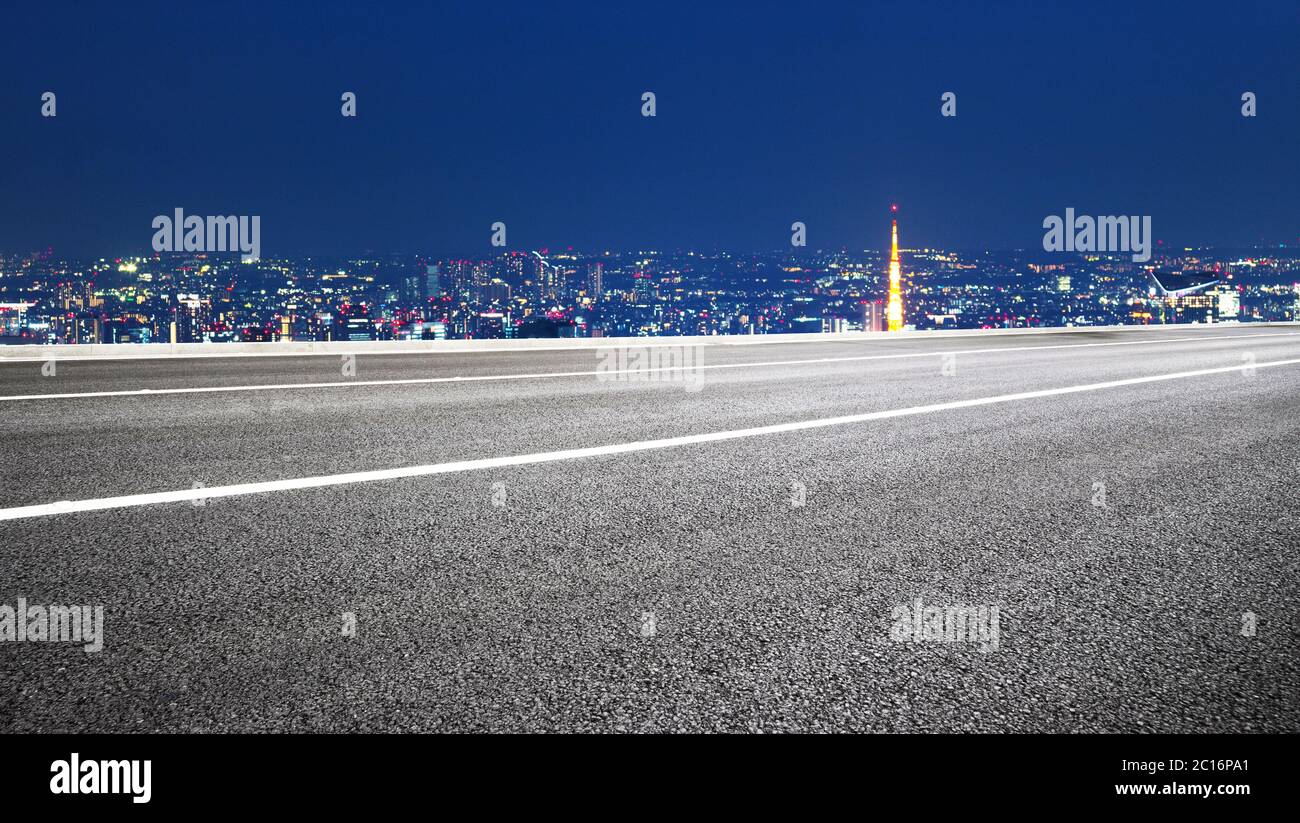 empty road with cityscape of tokyo at night Stock Photo - Alamy