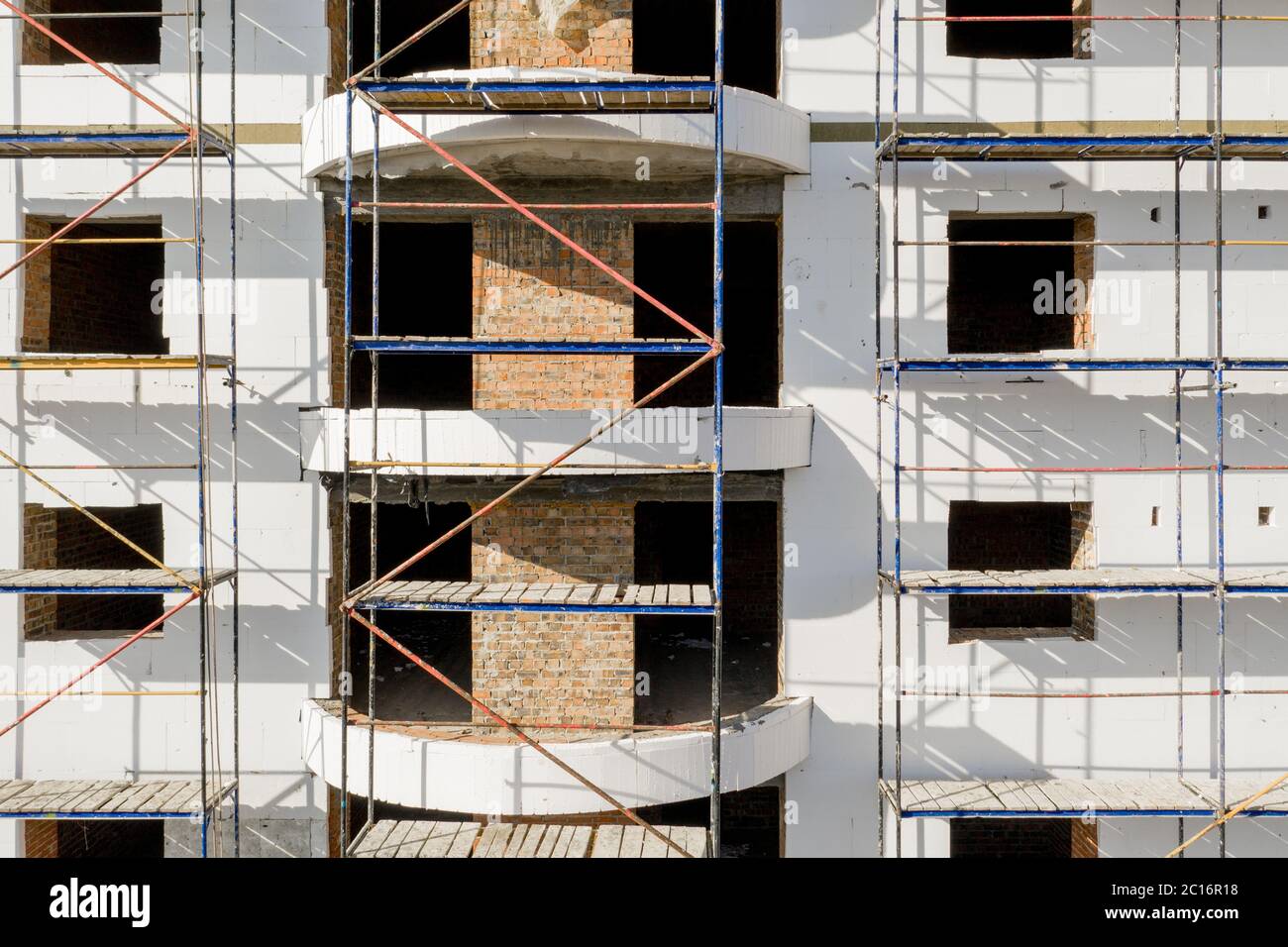 scaffold near the high-rise building for plaster Stock Photo - Alamy