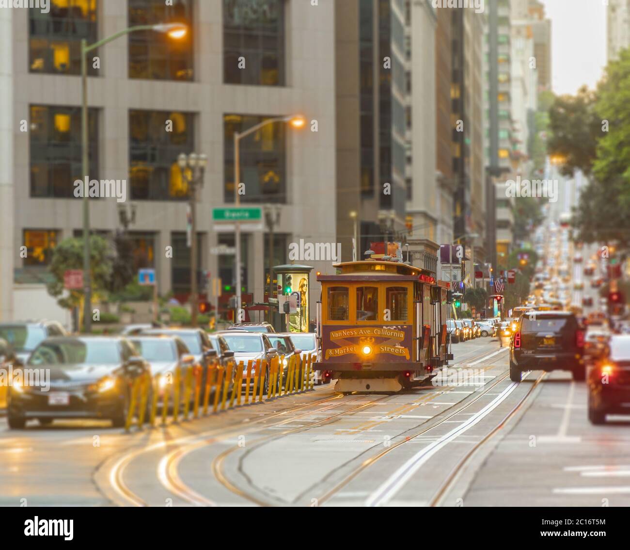 San Francisco Cable Car on focus with blurred traffic on California ...