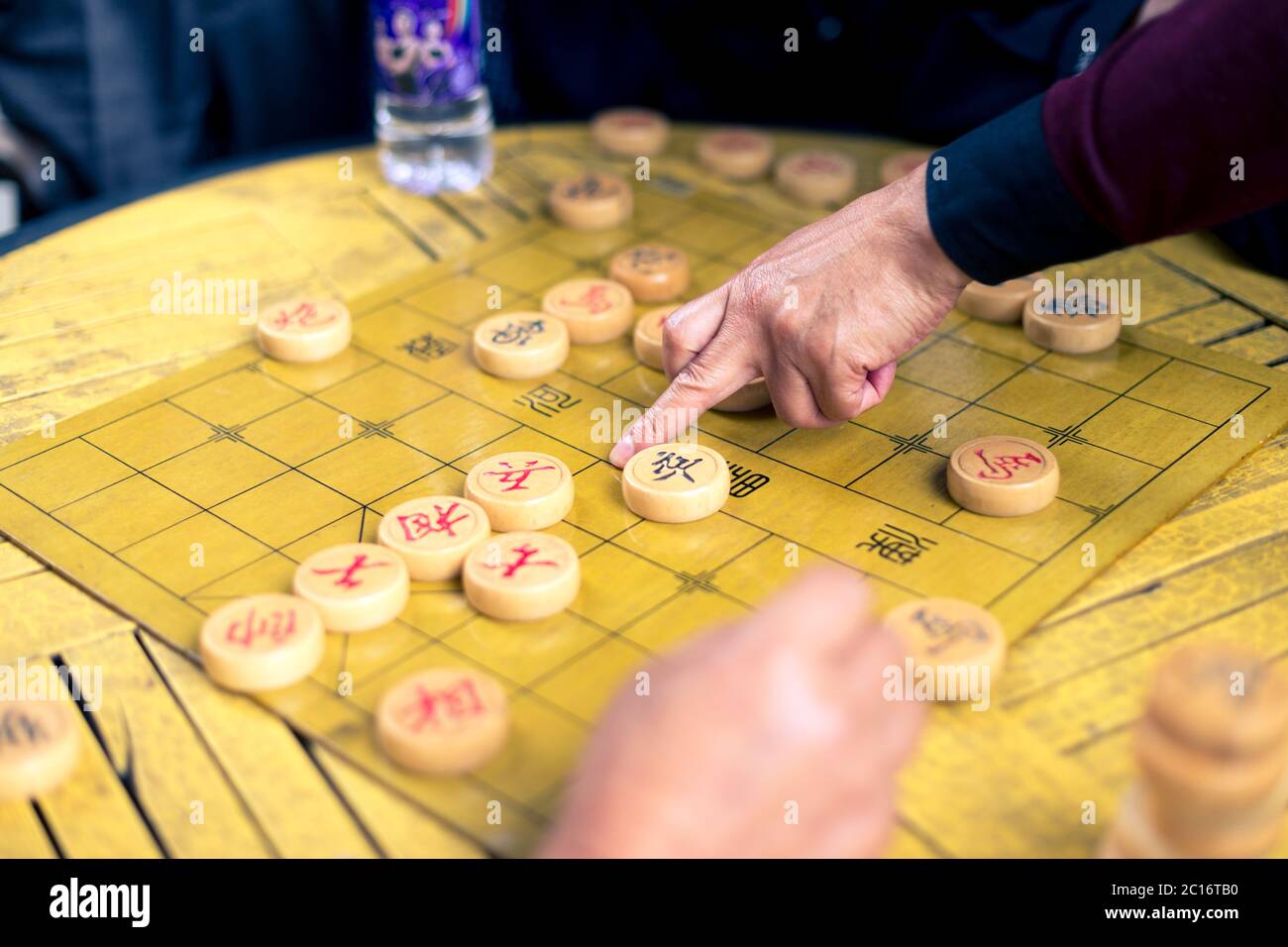 people playing chinese chess in park Stock Photo - Alamy