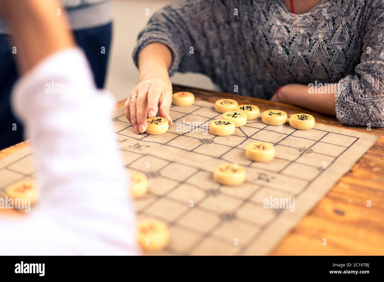 people playing chinese chess in park Stock Photo - Alamy