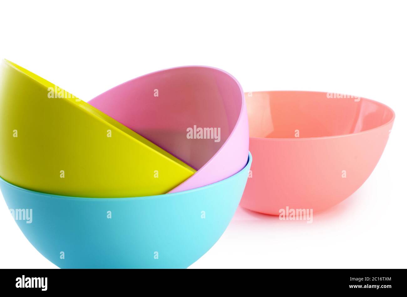 Plastic colorful plates isolated on white Stock Photo - Alamy