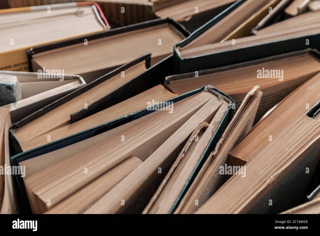 A set of books of different sizes lying on the floor Stock Photo - Alamy