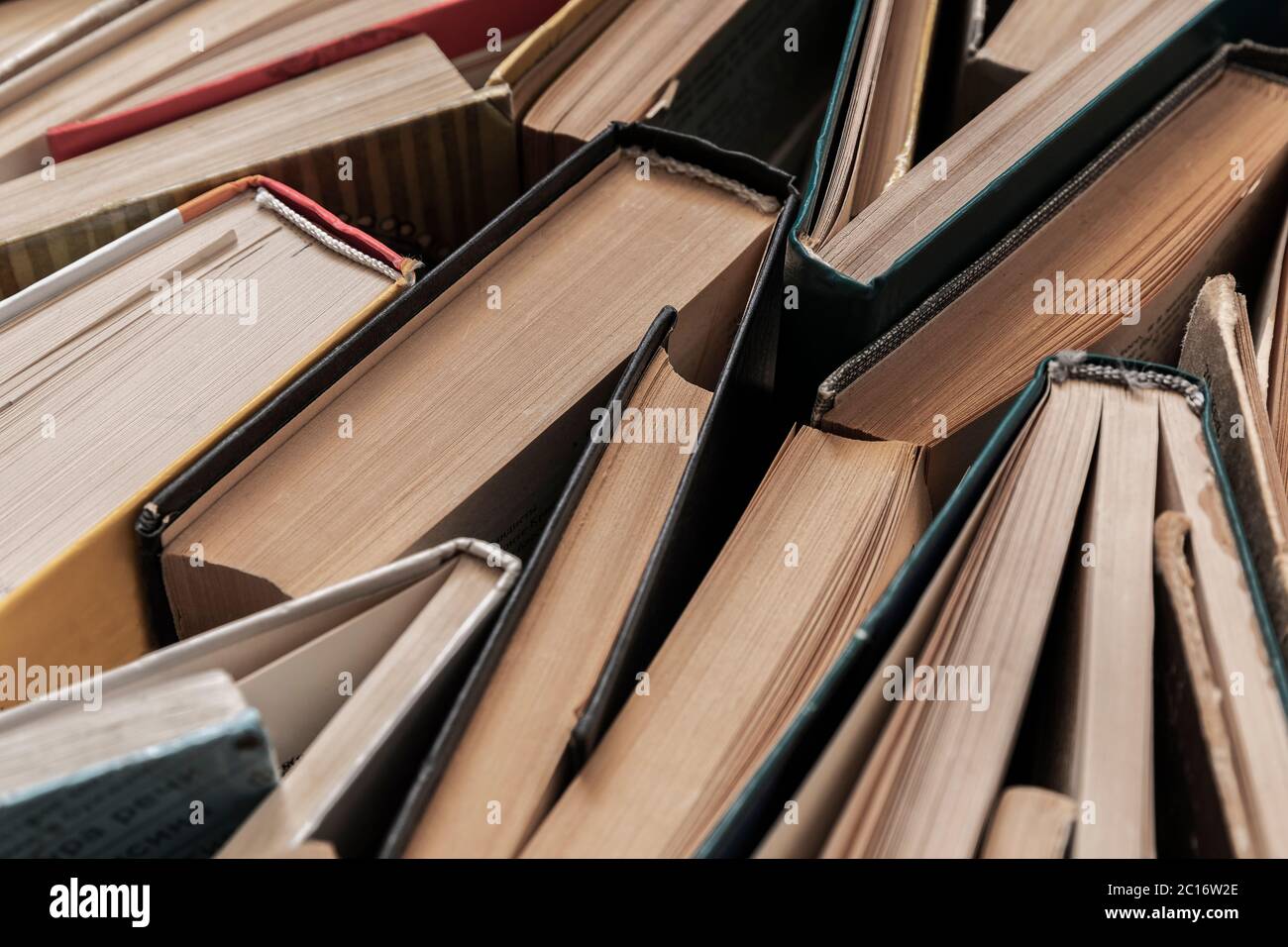A set of books of different sizes lying on the floor Stock Photo - Alamy