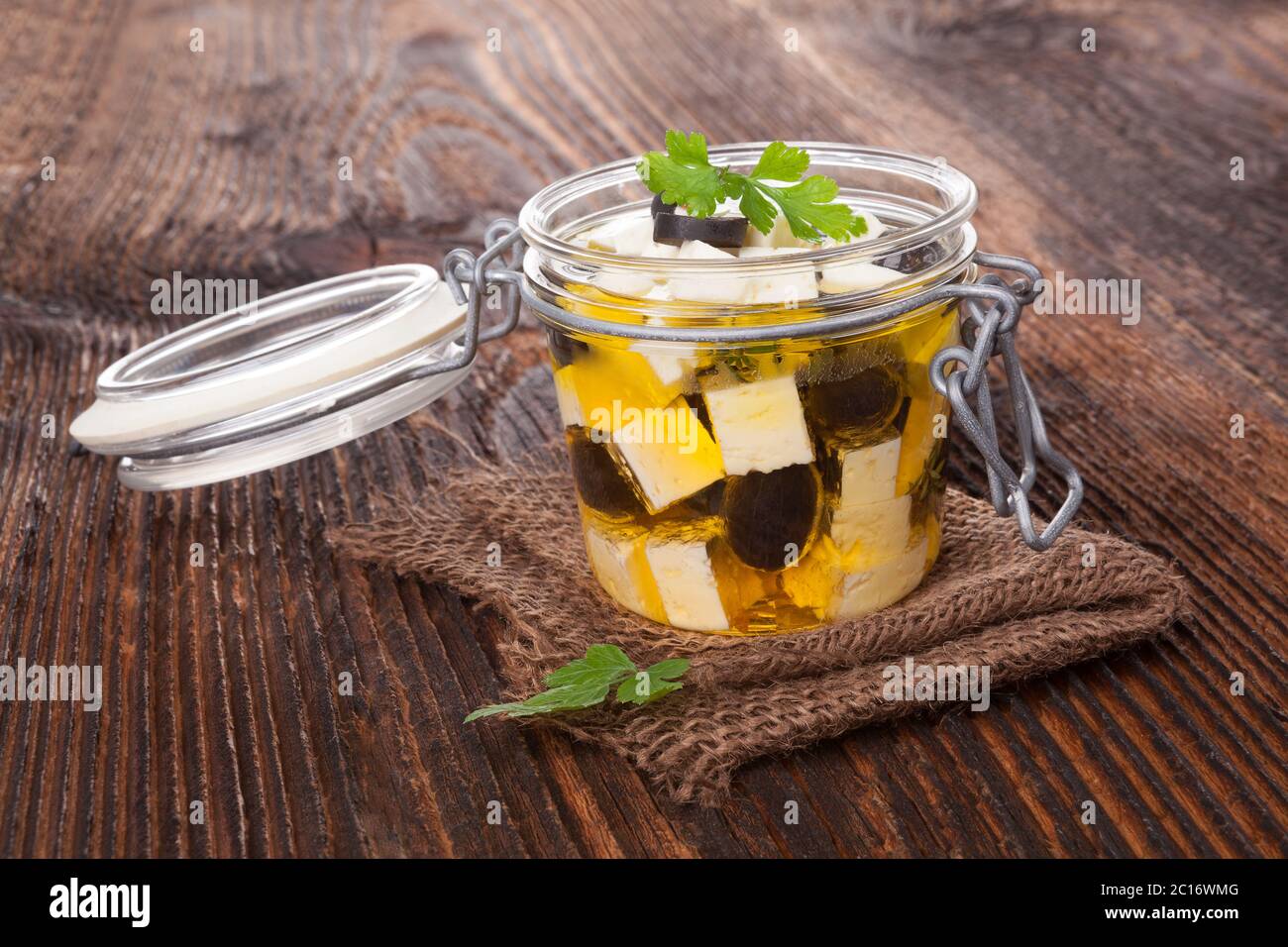 Preserved cheese in oil Stock Photo - Alamy