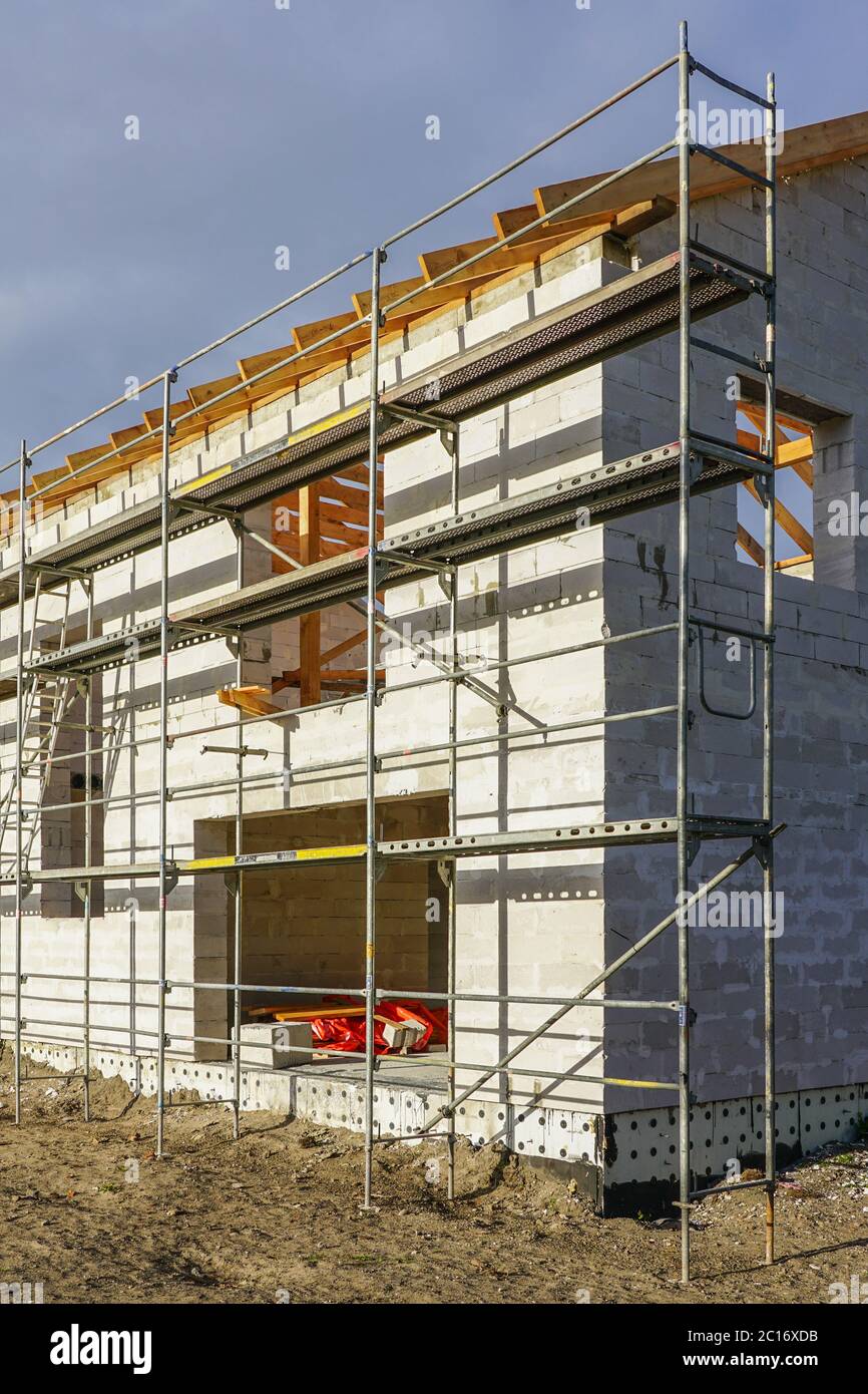 exterior view of new house under construction Stock Photo - Alamy