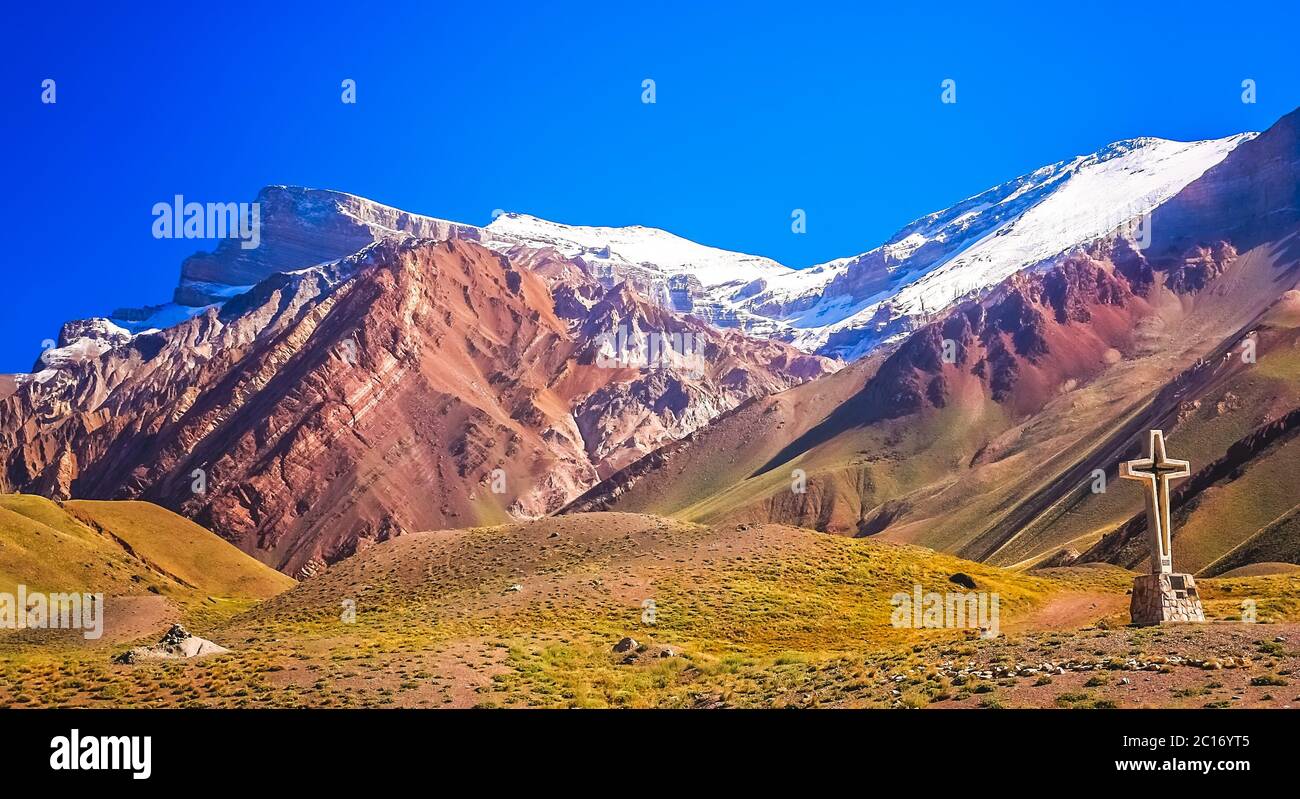 Cross in the argentinian Andes Stock Photo - Alamy