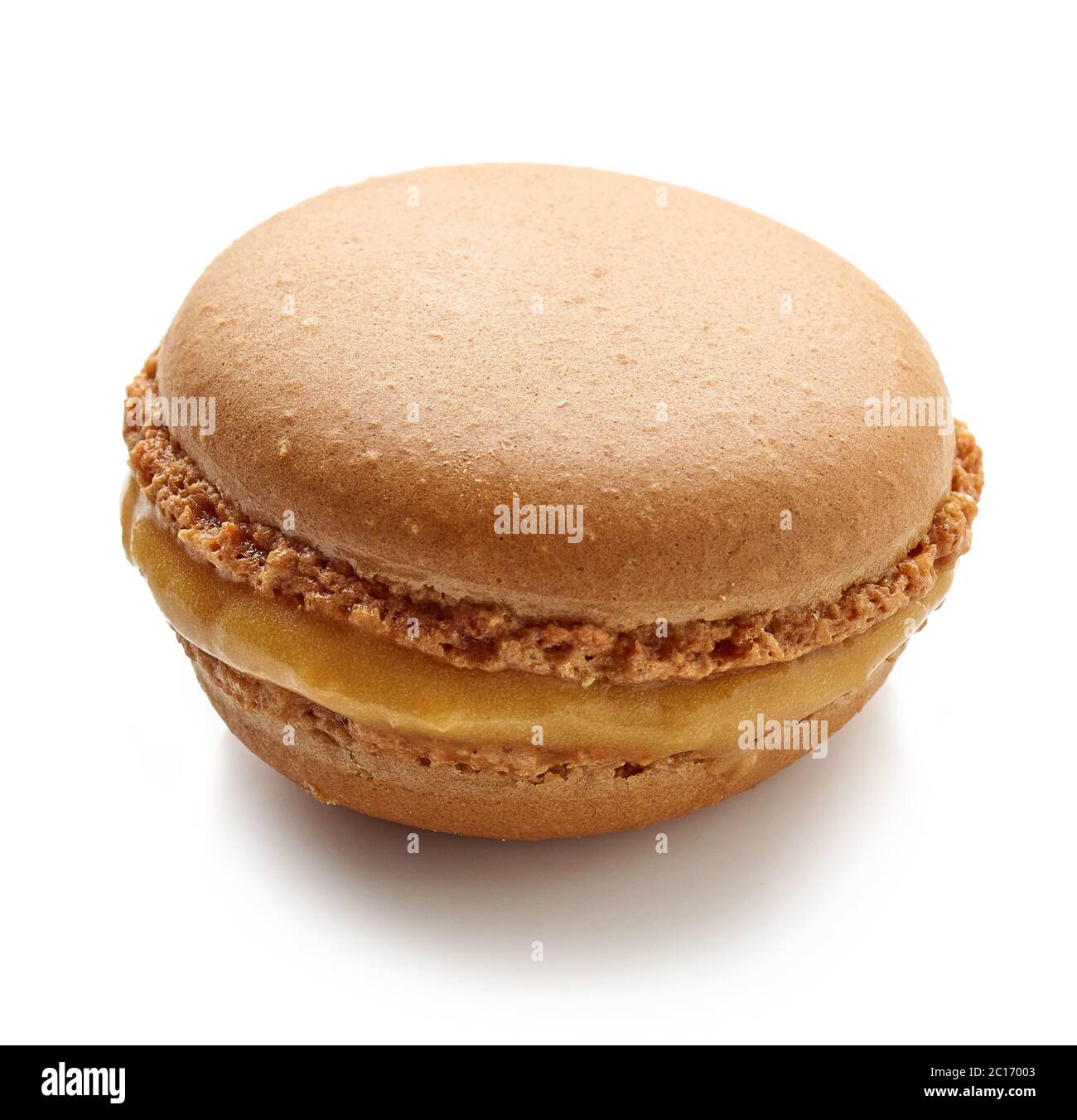 caramel macaroon isolated on white background Stock Photo - Alamy