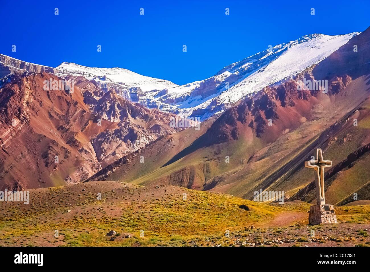 Cross in the argentinian Andes Stock Photo - Alamy