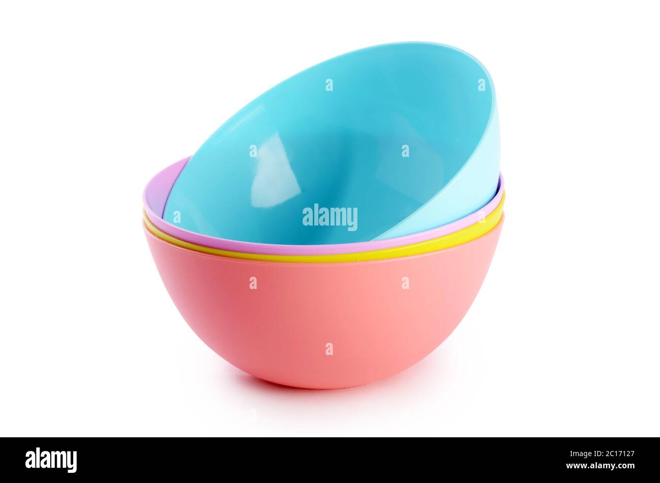 Plastic colorful plates isolated on white Stock Photo - Alamy