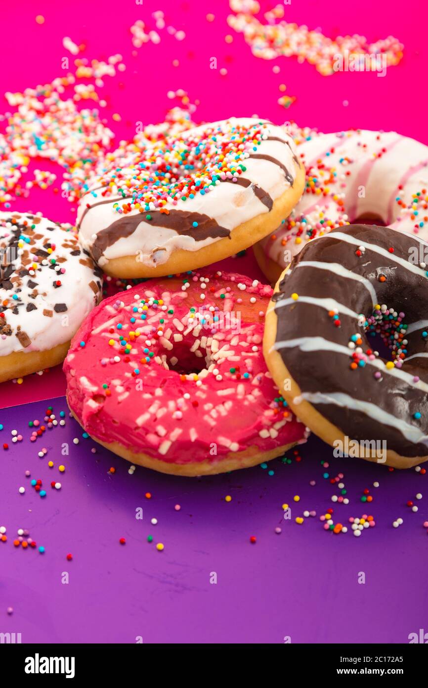 Donuts on color background hi-res stock photography and images - Alamy