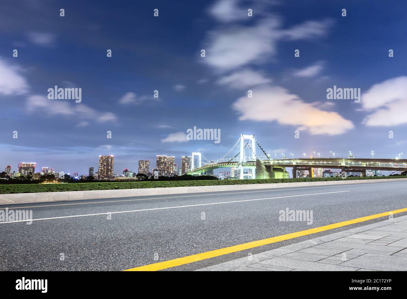 empty road with suspension bridge in modern city Stock Photo - Alamy