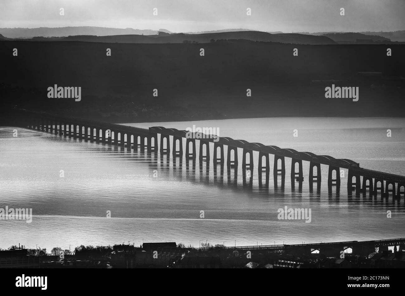 Monochrome (black and white) image of the Tay Rail Bridge from Dundee ...