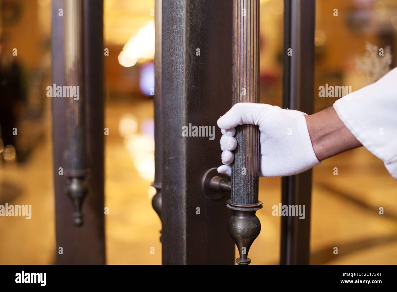young asian porter with door Stock Photo - Alamy