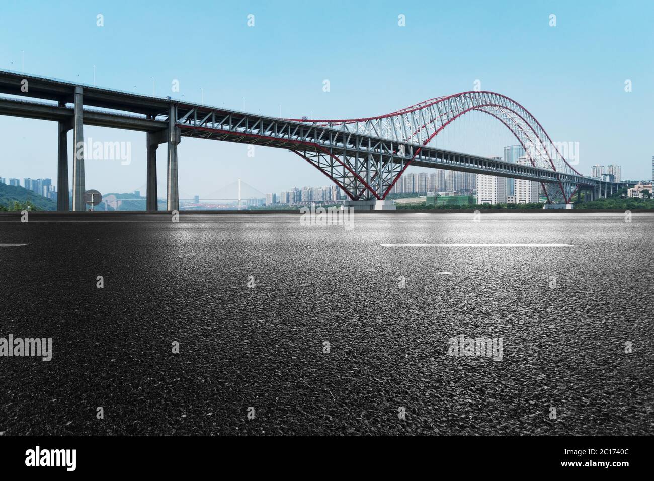 empty road near steel bridge in modern city Stock Photo - Alamy
