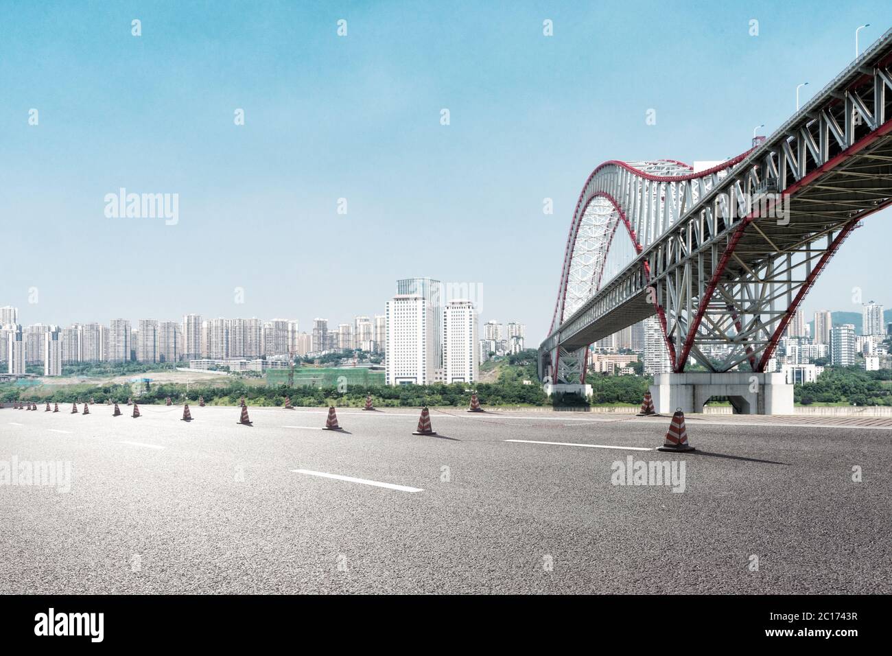 empty road near steel bridge in modern city Stock Photo - Alamy