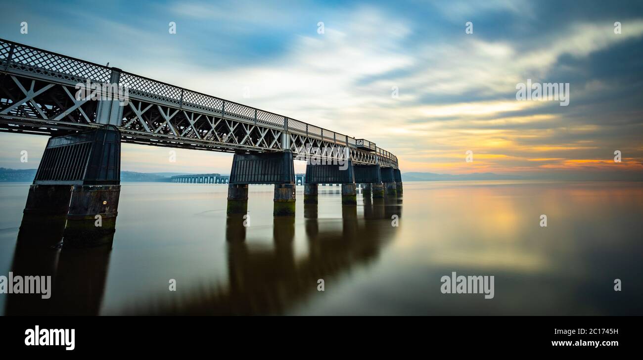 Long exposure image of the Tay Rail Bridge at sunset, Dundee, Scotland ...