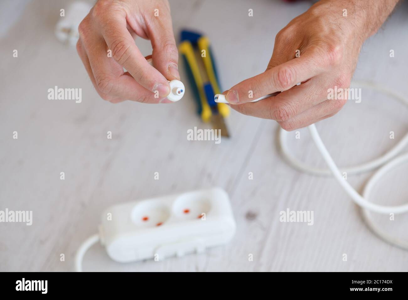 Cut of electric cable for extension plug Stock Photo - Alamy